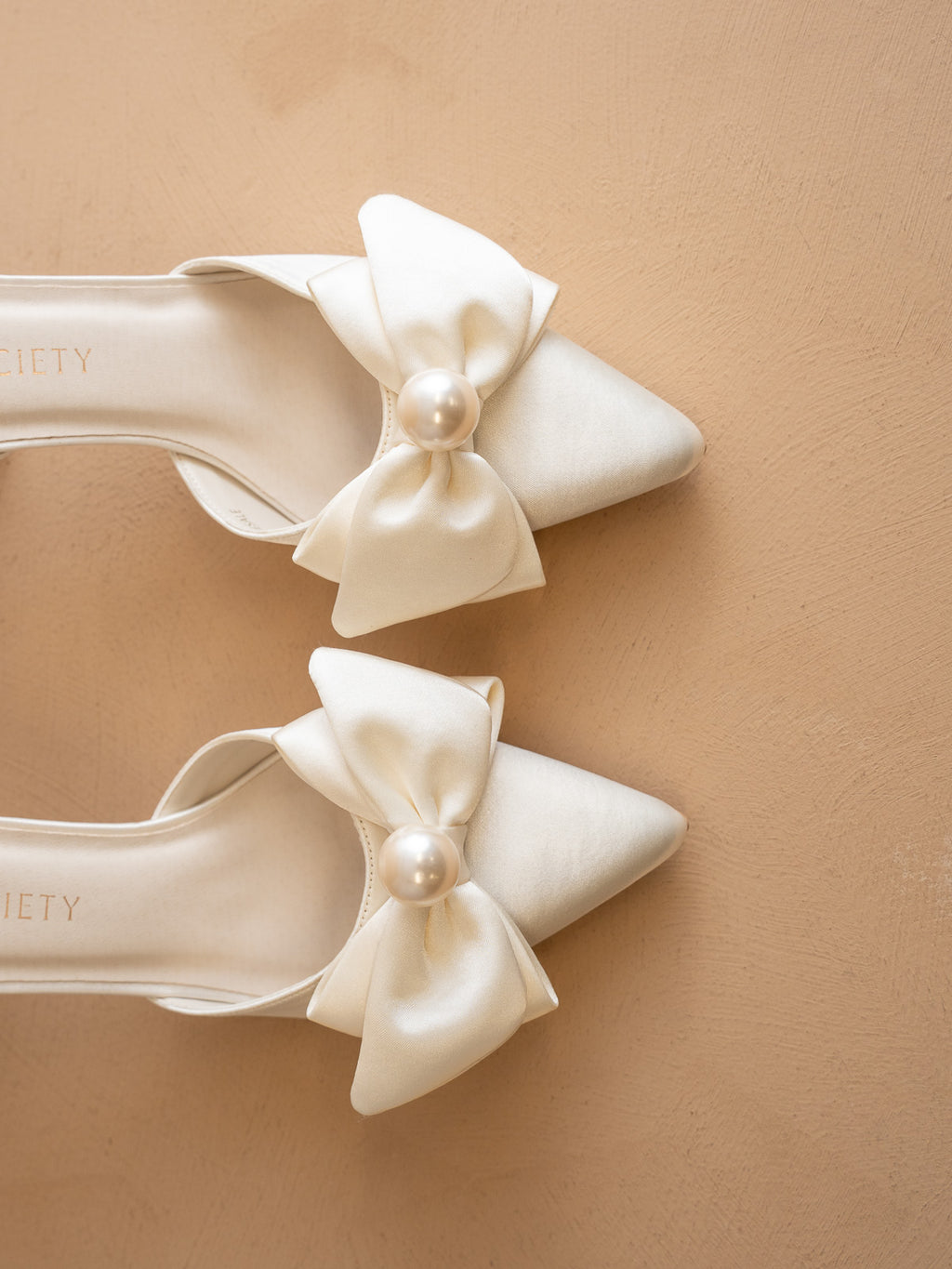 The Colette | Ivory Pearl Bow Bridal Heel – Oasis Society